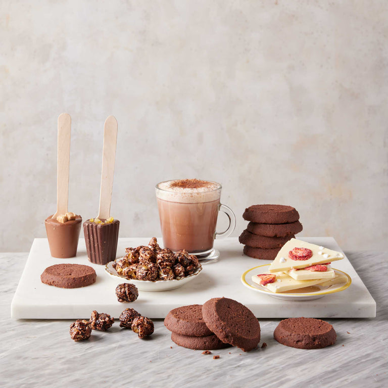 Luxury Cake And Food Hampers Delivered UK | Cutter & Squidge