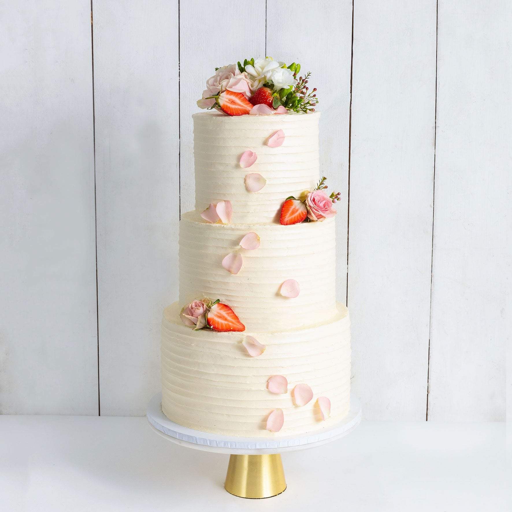 Three Tier Floral Ruffle Wedding Cake – Cutter & Squidge