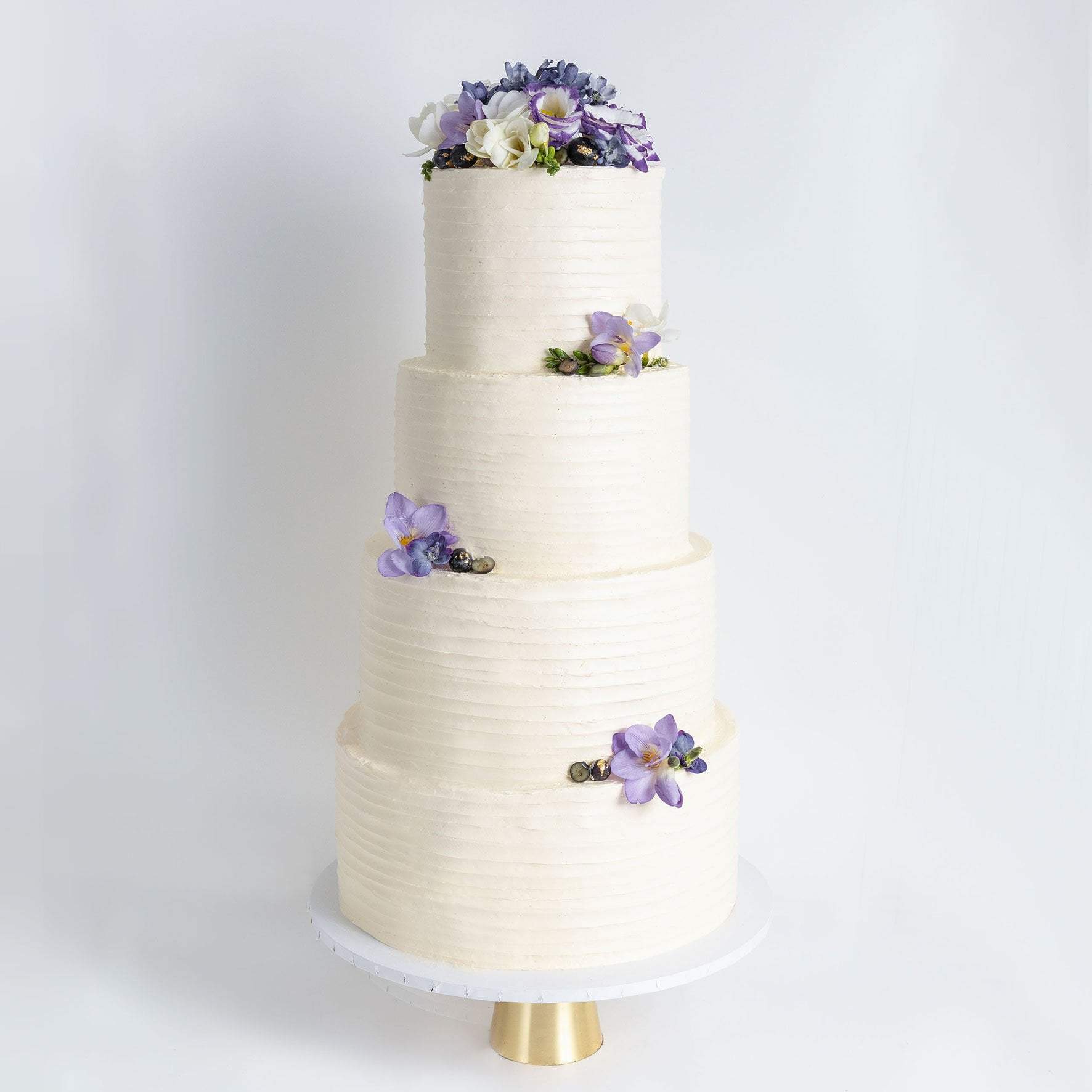 Four Tier Floral Ruffle Wedding Cake – Cutter & Squidge